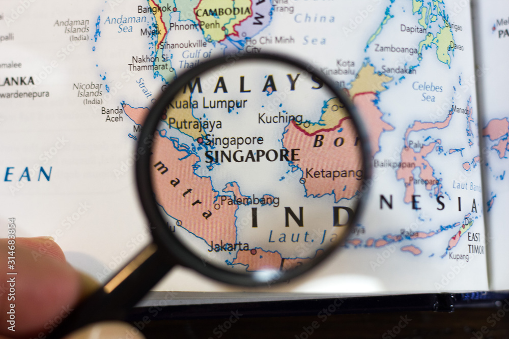 Singapore on the map of the world. Stock Photo | Adobe Stock