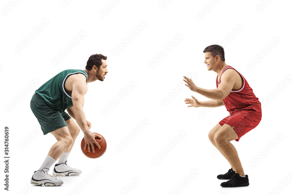 Two basketball players from opposite teams playing a match Stock Photo ...