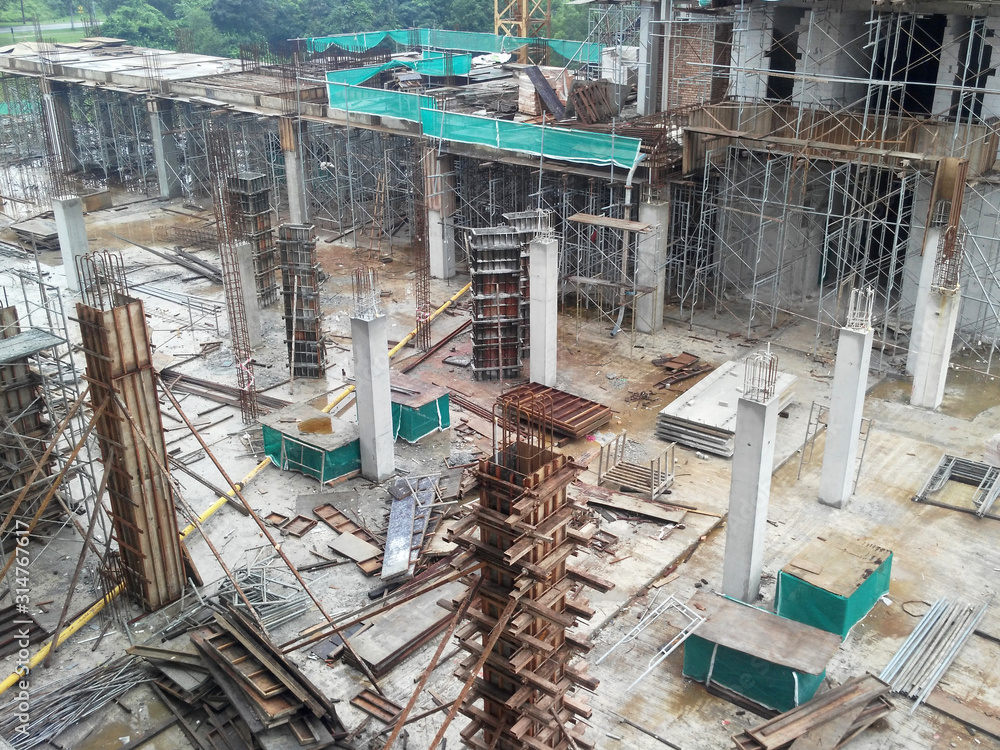 Steel reinforced concrete column under construction. It is as part of ...