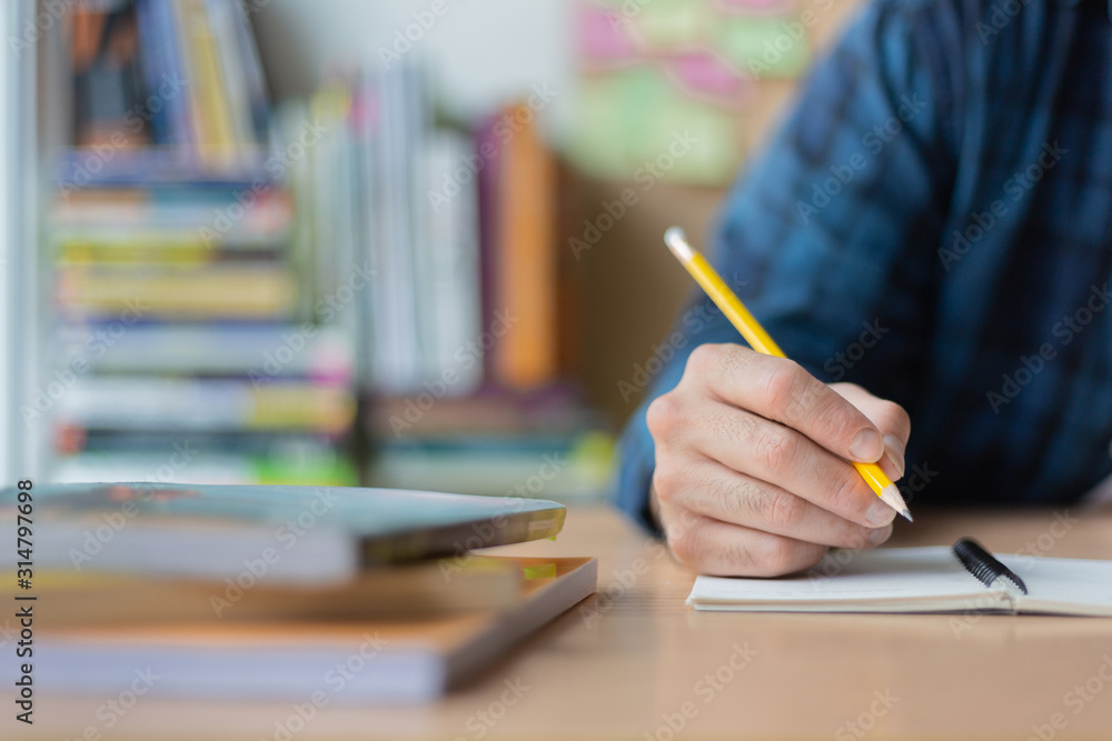 high school,university student study.hands holding pencil writing paper ...