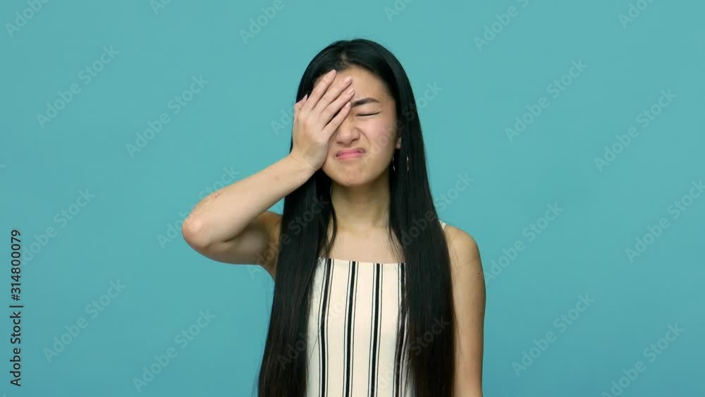Oh no, i forgot! Unhappy asian woman with long straight black hair ...