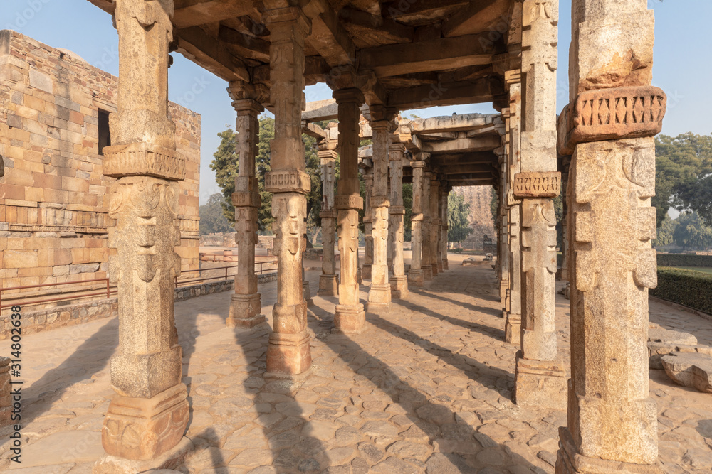 Ruins of Qutub Minar complex, a UNESCO world heritage site in New Delhi ...