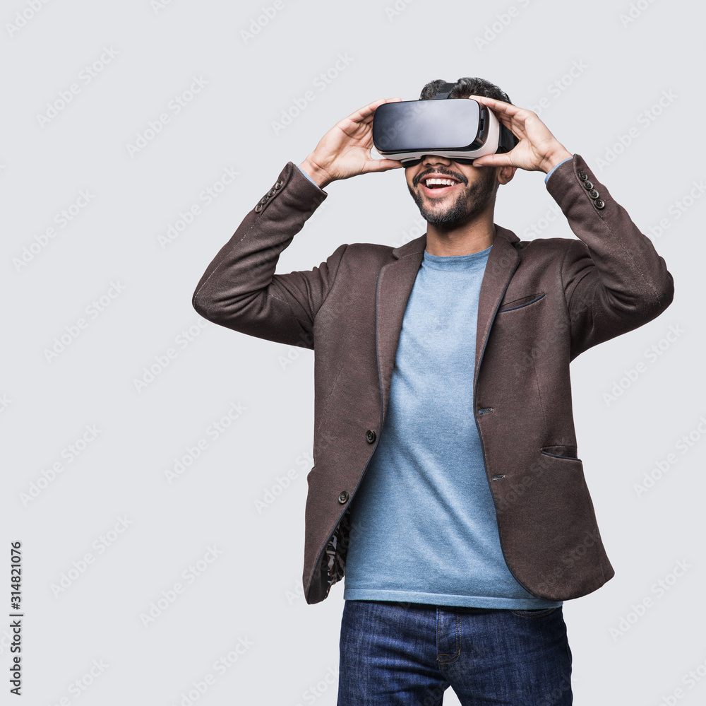 Young man using virtual reality headset. VR, future, gadgets ...