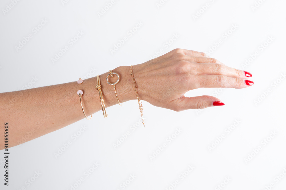 Detail of many several bracelet on woman Hand arm Model Stock Photo ...