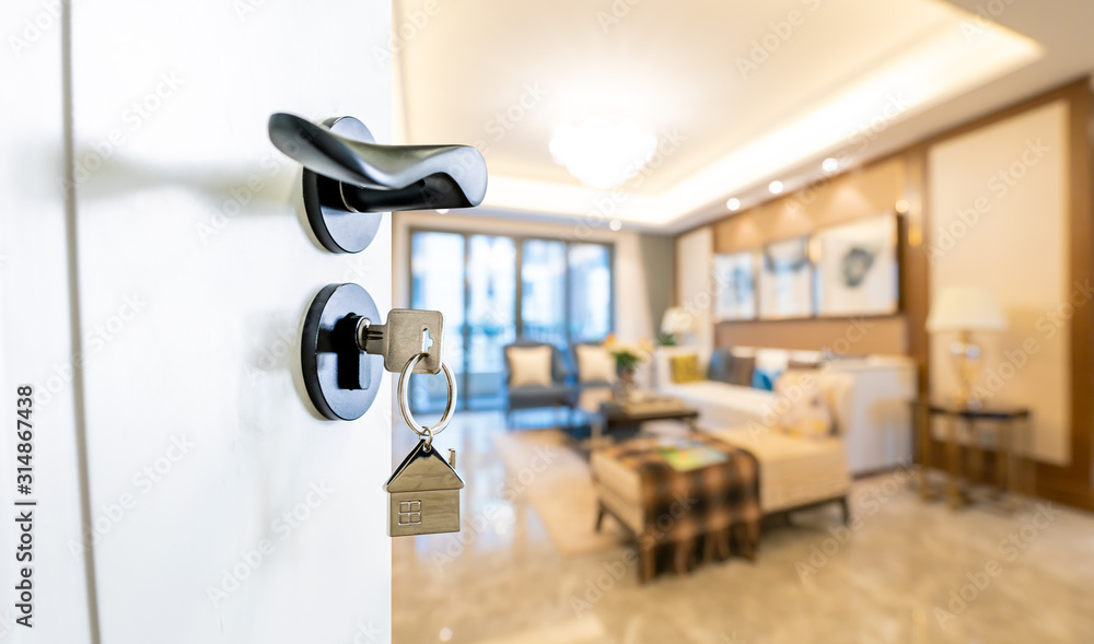 Open door with keys, key in keyhole Stock Photo | Adobe Stock