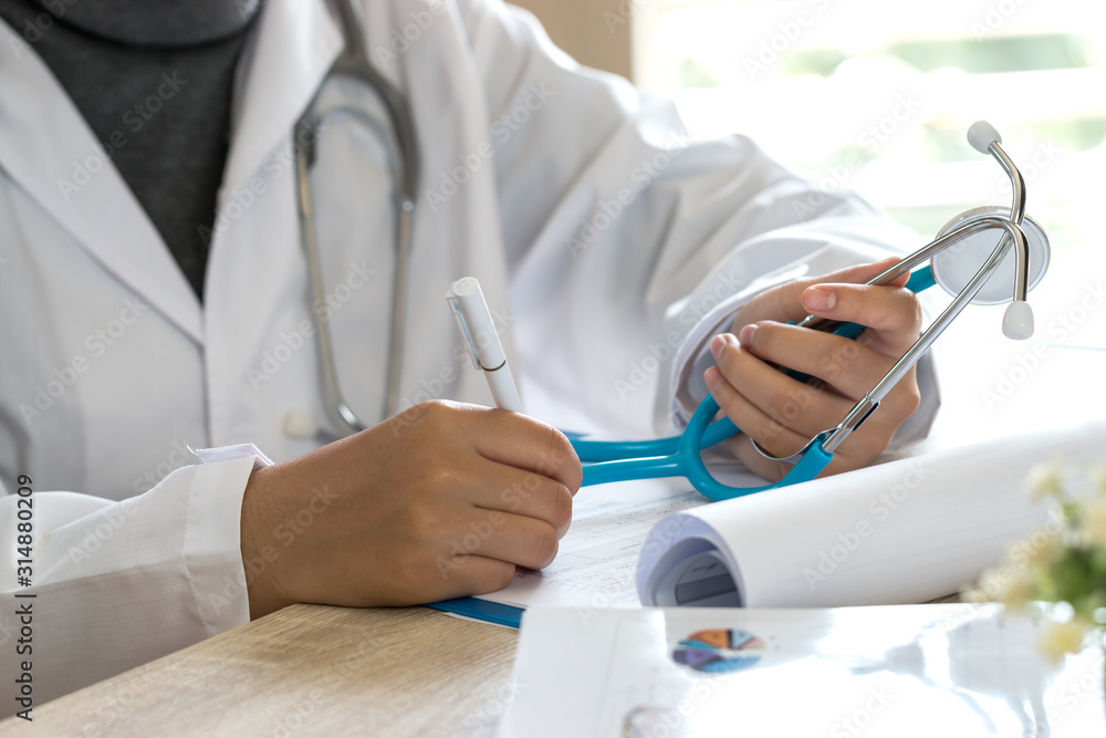 Healthcare and medical concept, Doctor or Female physician writing ...