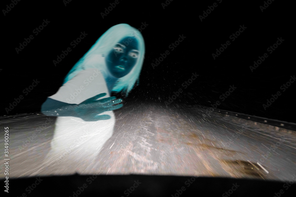 llustration of a ghost that appears in the headlights in front of a car ...