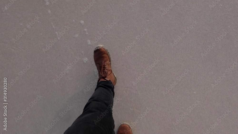 Top Down view of walking on a sand beach at the lofoten islands with ...