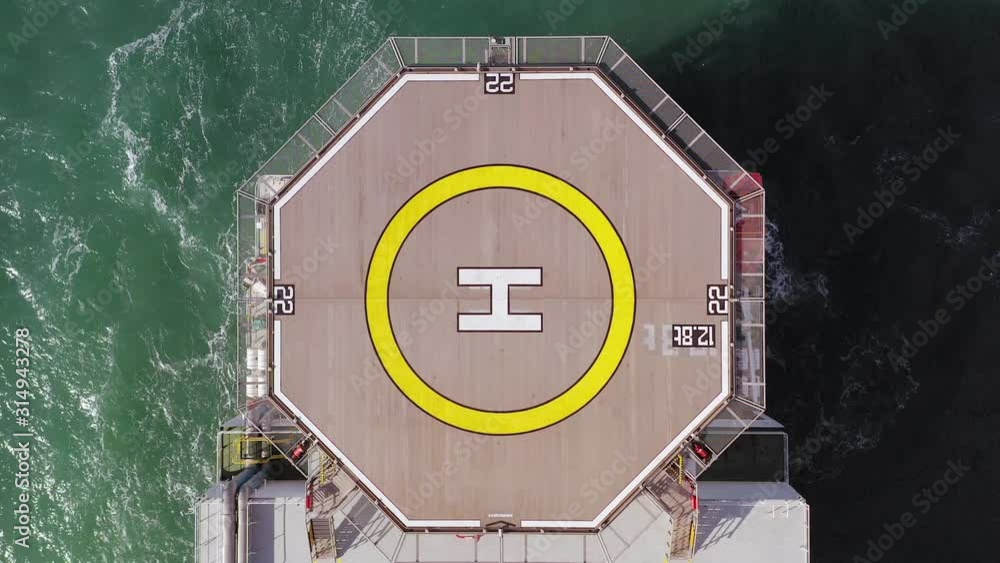 Top down aerial view of a Helicopter deck on a large Supply ship. Stock ...