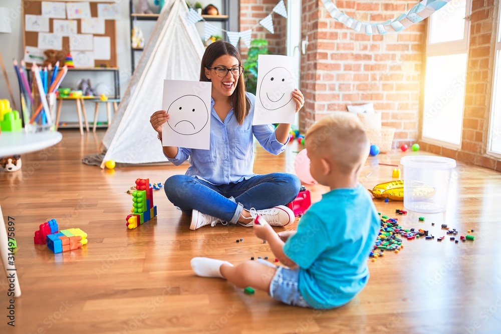 Young therapist woman speaking with child, counselor and behaviour ...