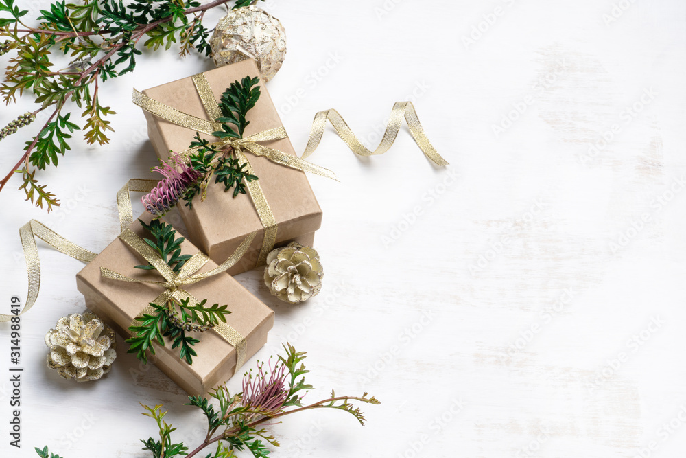 Australian inspired Christmas background. Gifts decorated with native ...