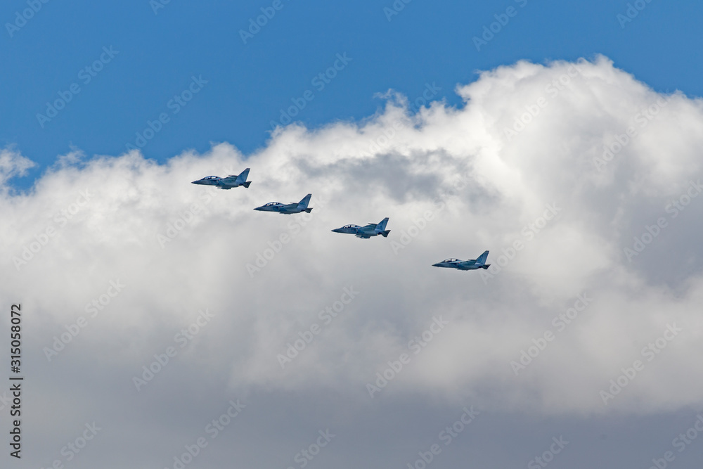 Russian Military jet in the air. Silhouettes of russian fighter ...