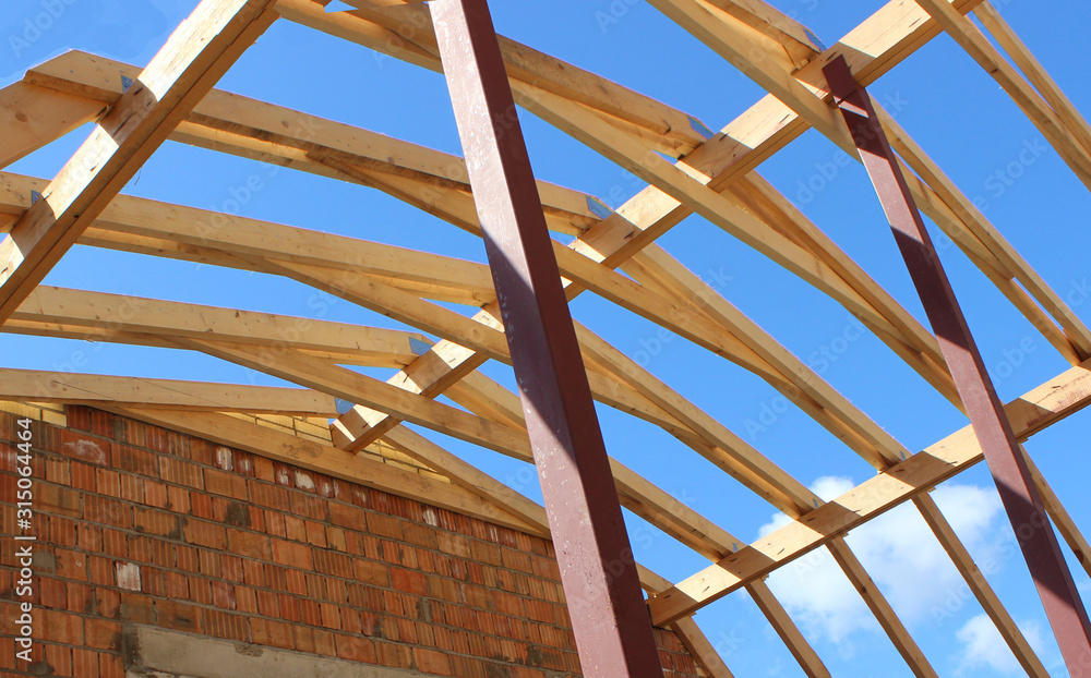 Roof trusses not covered with ceramic tile on a detached house under ...