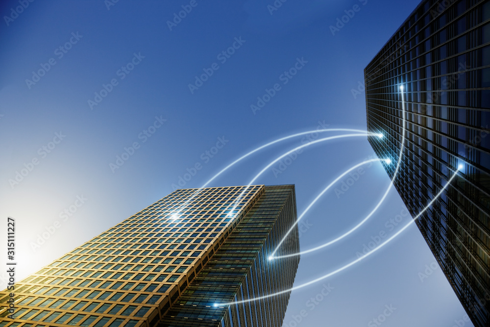 Fiber optic light communication connecting highrise buildings, concept ...