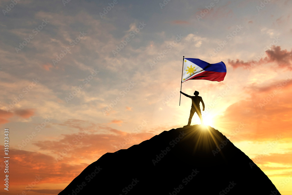 Phillipines flag being waved at the top of a mountain summit. 3D ...