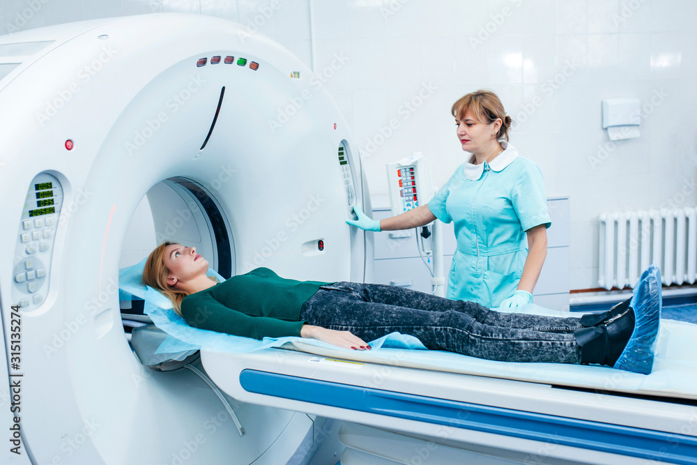 Doctor analyzes the patient on CT Scan in modern hospital Stock Photo ...