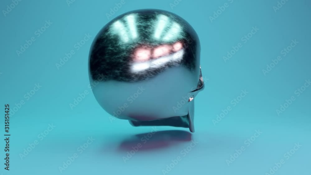 A scratched metal human skull rotates 360 degrees against a glamorous ...