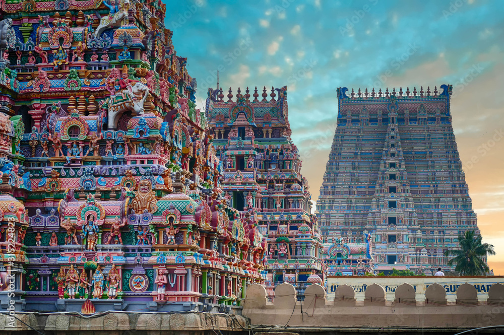 Multi colored gods and goddesses adorn the gopuram Stock Photo | Adobe ...