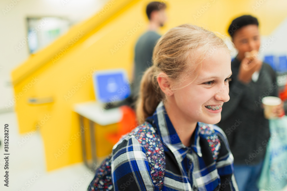 Smiling junior high girl student with braces Stock Photo | Adobe Stock