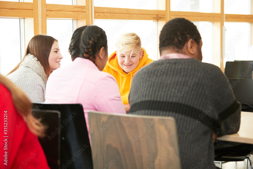 College students studying in classroom Stock Photo | Adobe Stock