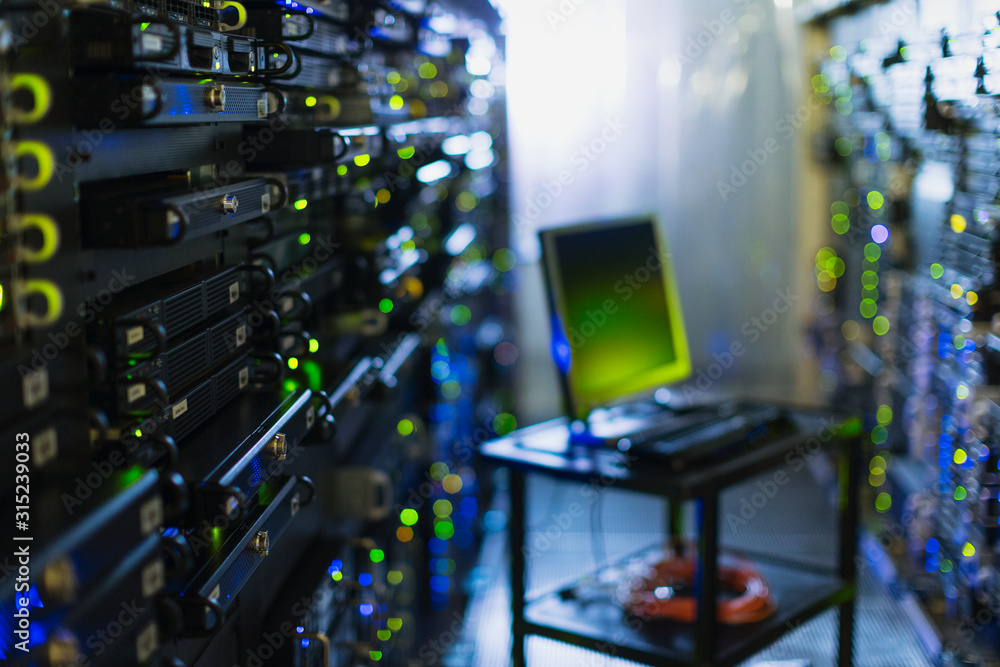 Computer on cart in server room corridor Stock Photo | Adobe Stock
