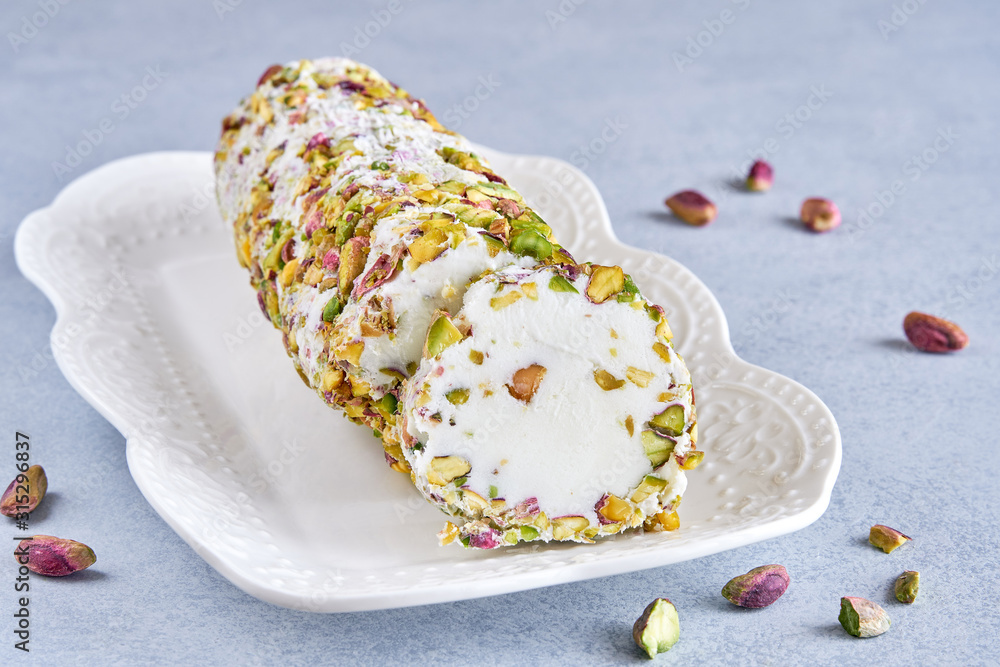 Traditional arabic ice cream with pistachio booza. Close up Stock Photo ...