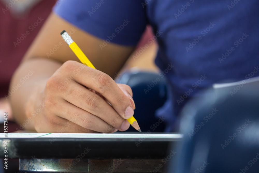 high school,university student study.hands holding pencil writing paper ...