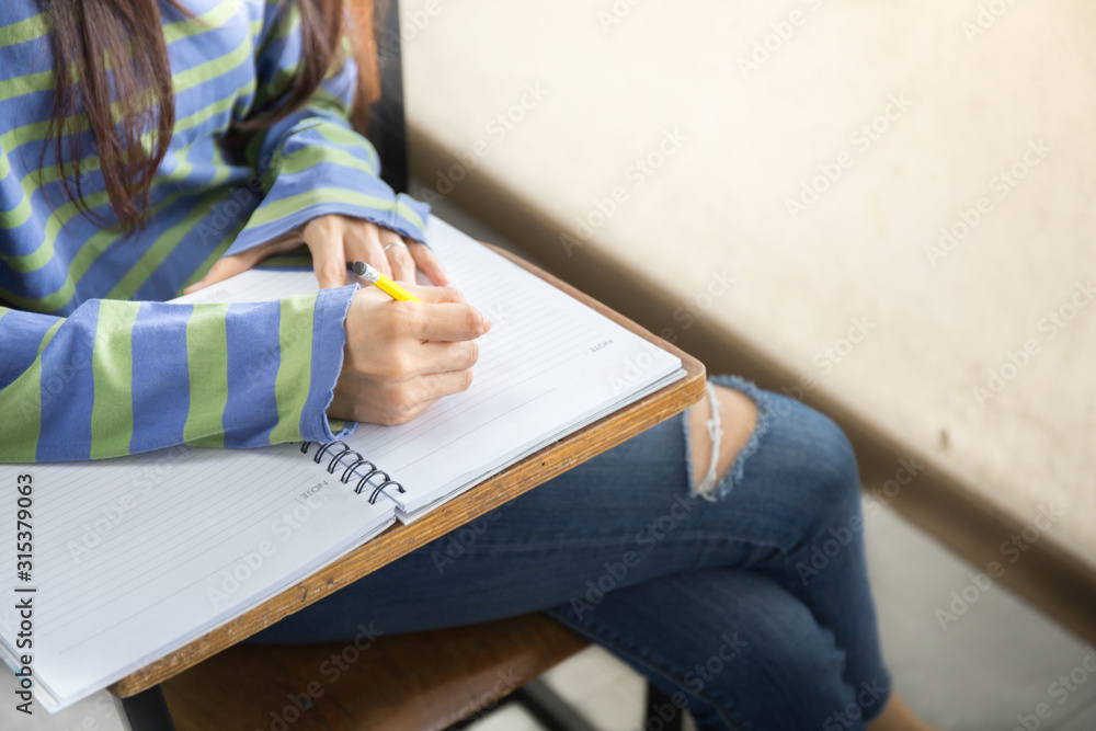 high school,university student study.hands holding pencil writing paper ...