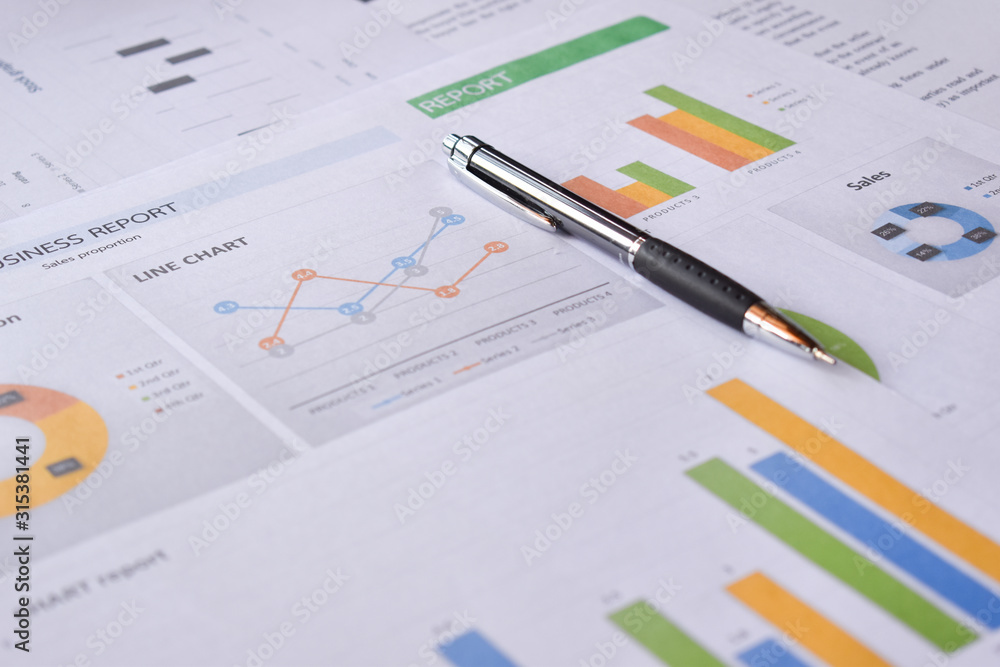 Documents about business charts and graph analysis with pan, placed on ...
