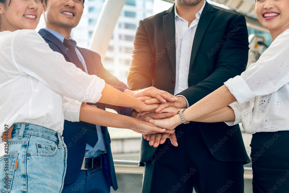 Merger,acquisition and power teamwork.Business partners teamwork join ...