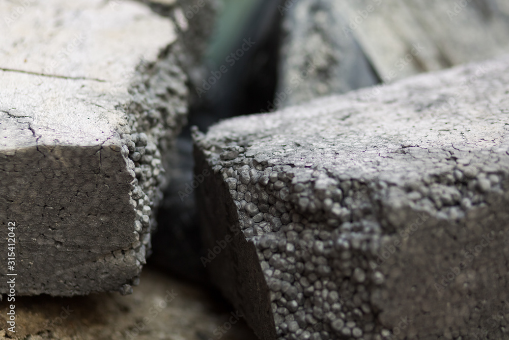 Old black broken styrofoam package block in waste container Stock Photo ...
