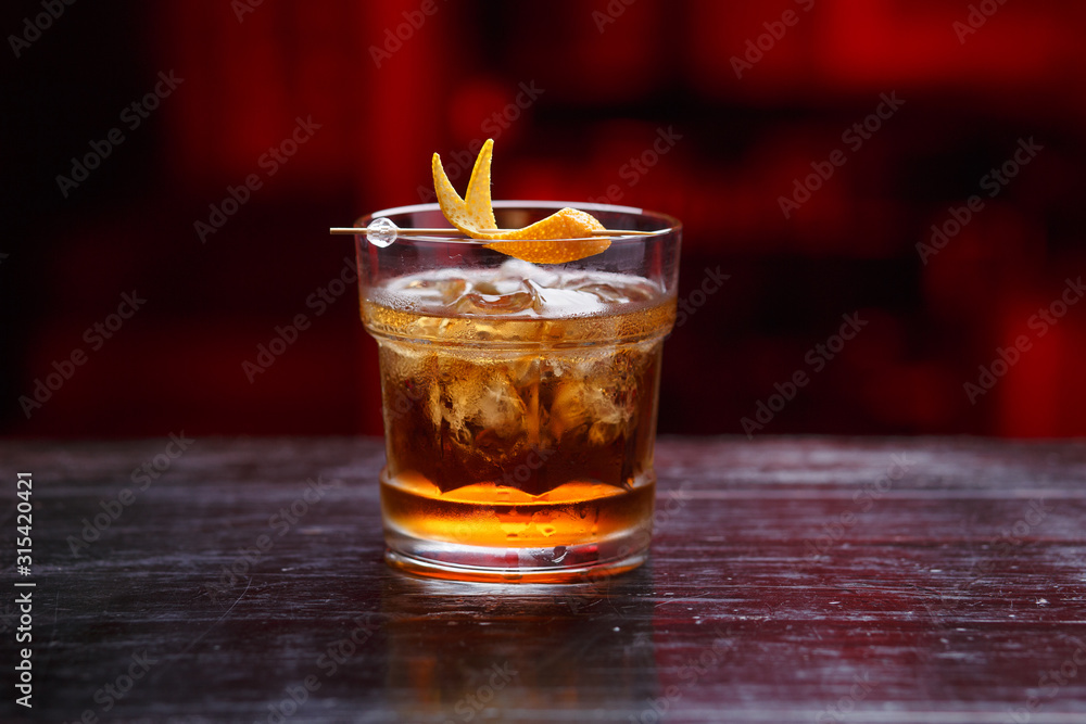 Food and drinks content. Closeup of a God father cocktail in short ...