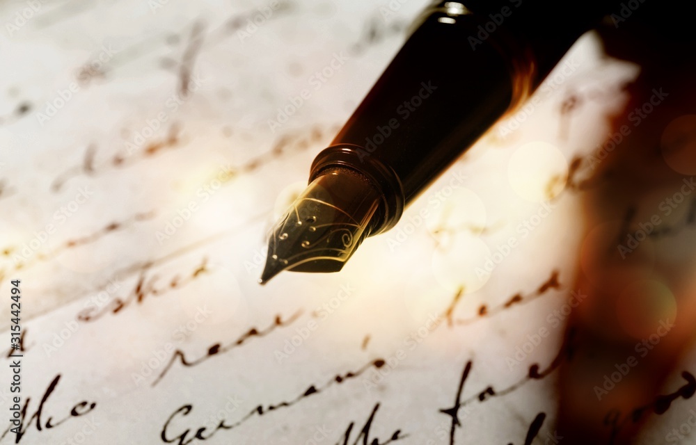 Signing a signature with a fountain pen Stock Photo | Adobe Stock