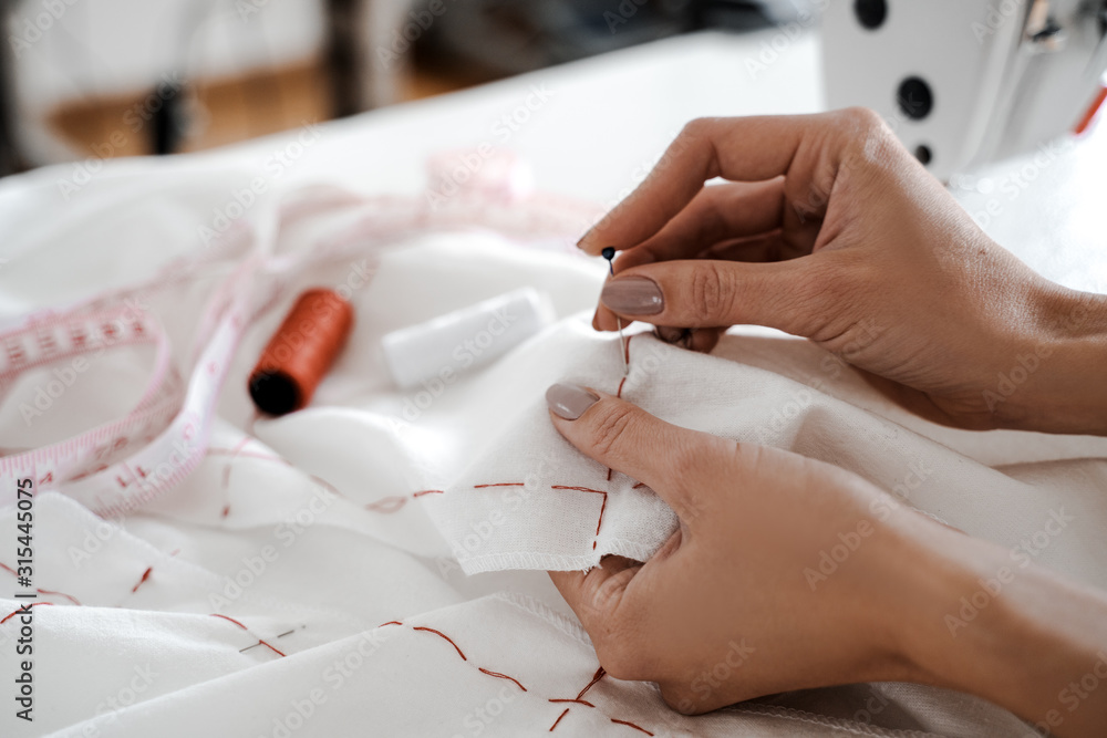Tailor professional detail, sewing and tailoring concept, tailor woman ...