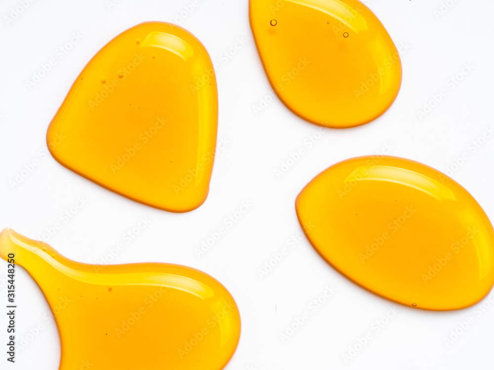 Honey drops. Abstract pattern from honey drops. Isolated on white with ...