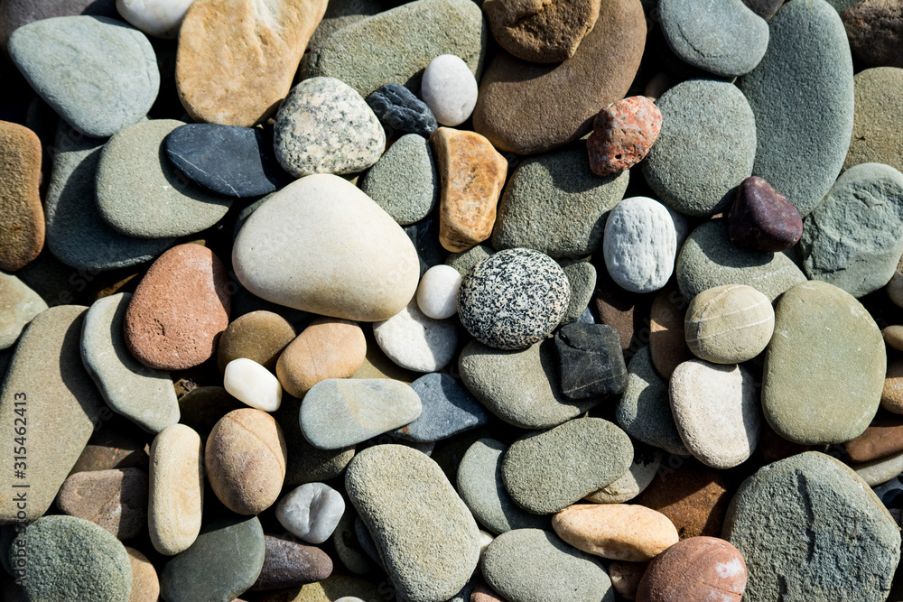 Color rendering of smooth and flat river rocks great for background ...