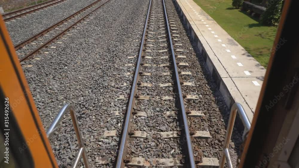 Runing train concept, last bogie bridge stairs on back train running on ...