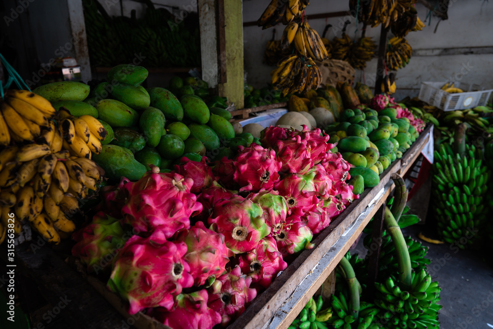 Tropical fruit organic dragon fruit on walking street market. Fruits at ...