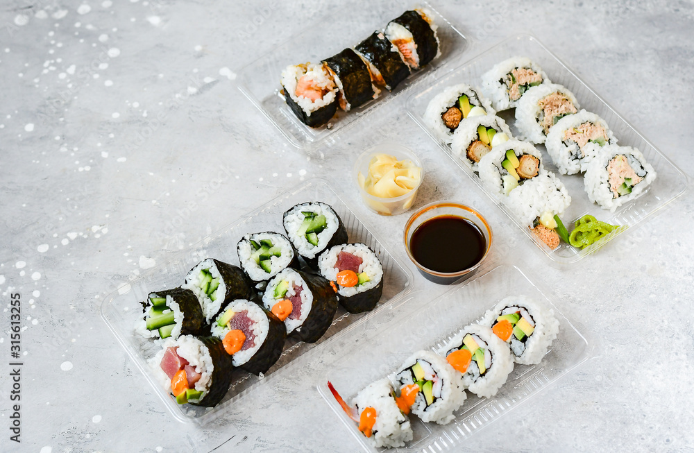 Food delivery concept. Lunch box with sushi set food delivery. Top view ...