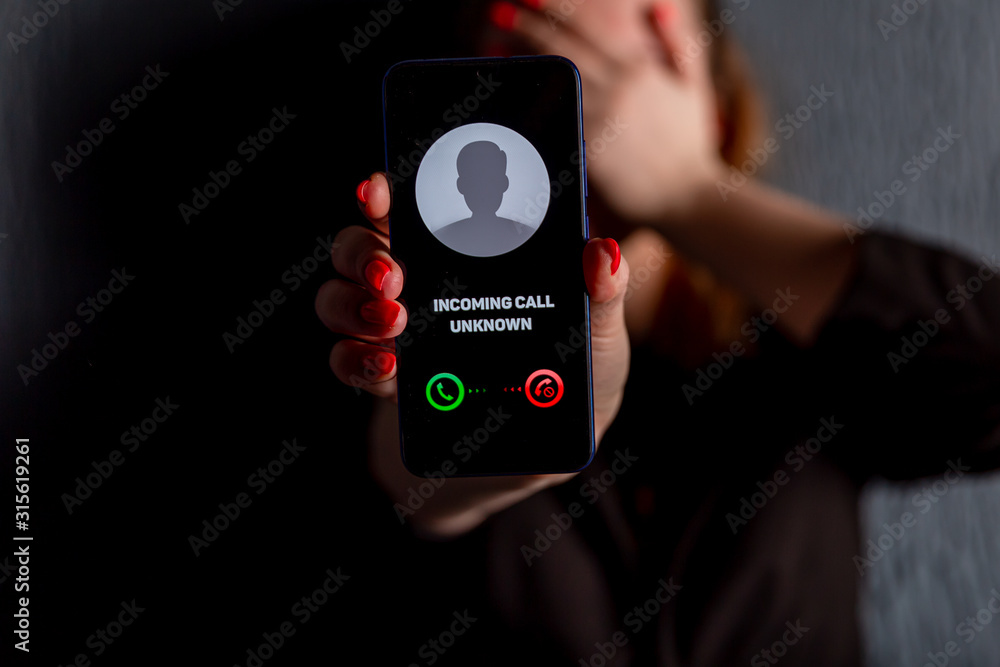 Phone call from unknown number. Scam, fraud or phishing with smartphone ...