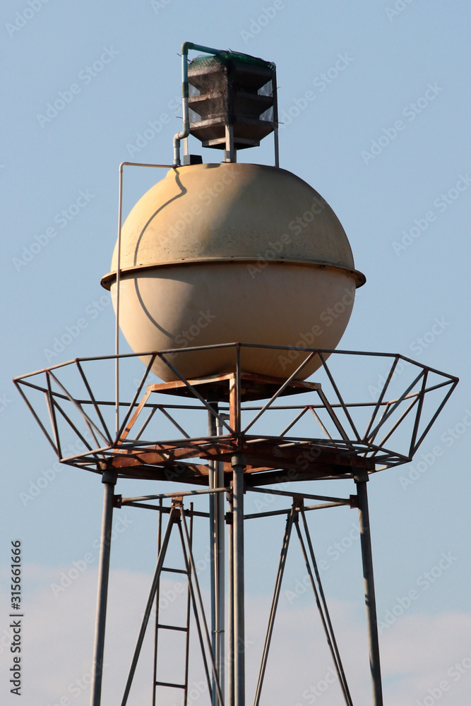 Spherical tank on a water tower Stock Photo | Adobe Stock