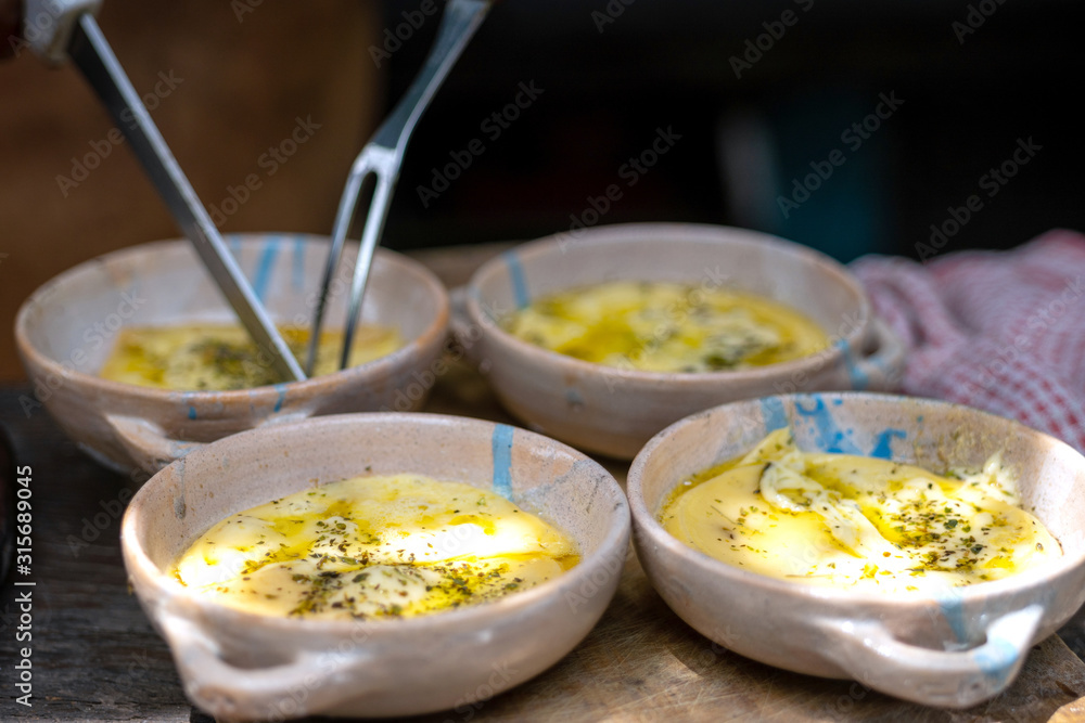 Provoleta is an Argentine variant of provolone cheese. It is eaten ...