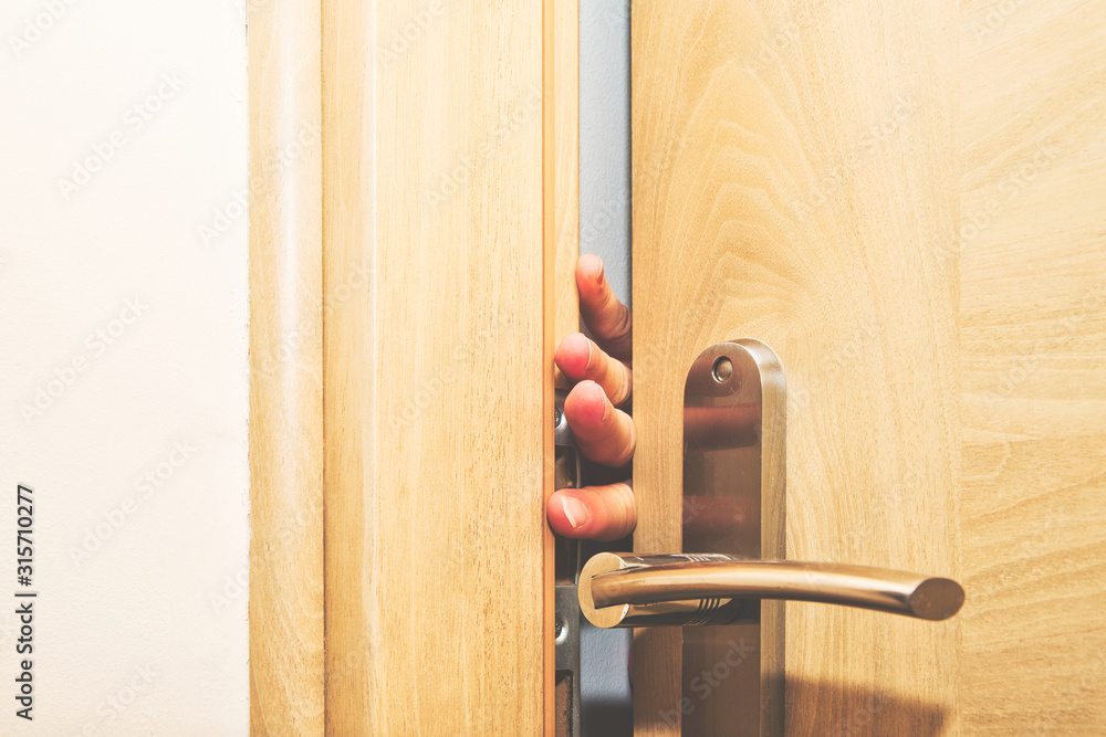 Pinching fingers at the door. Finger injury concept. Lack of attention ...