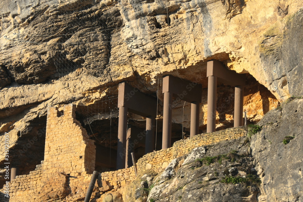 Excavation works being carried out in a cavern on the cliffs of Roque ...