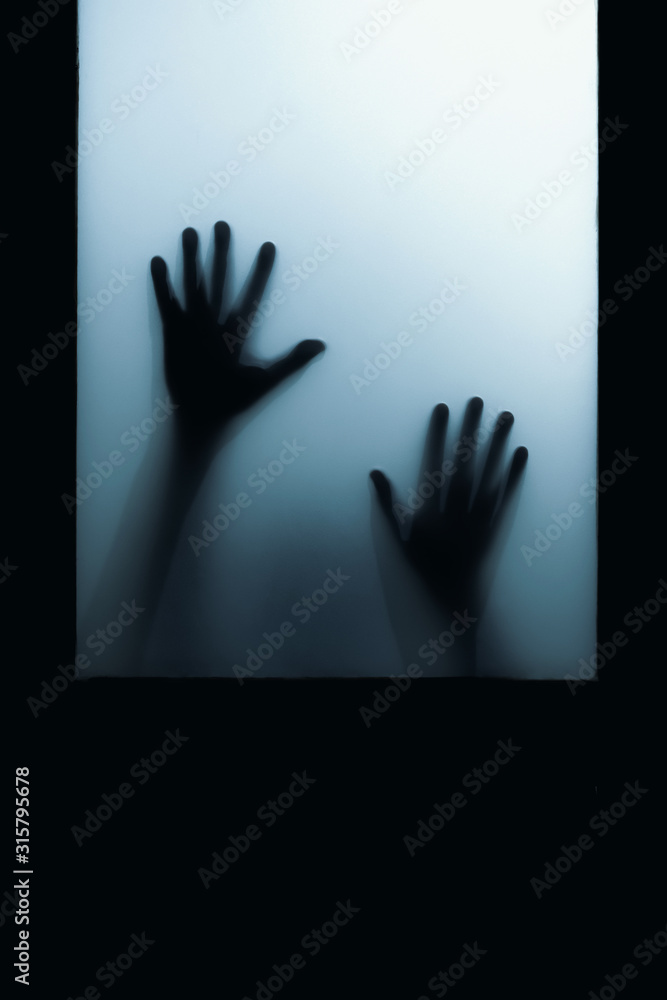 shadow of hand touch behind frosted glass Stock Photo | Adobe Stock