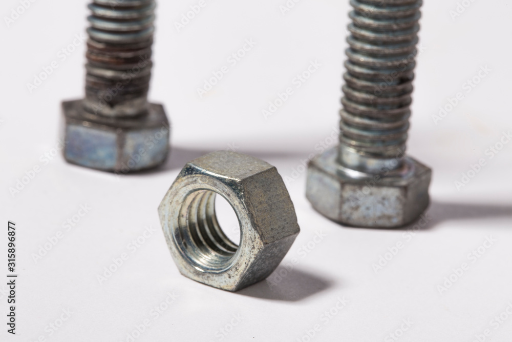 Rusty screw and nuts isolated on white background. Bolts and nuts Stock ...