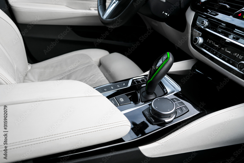 Modern luxury car white leather interior with natural wood panel. Part ...