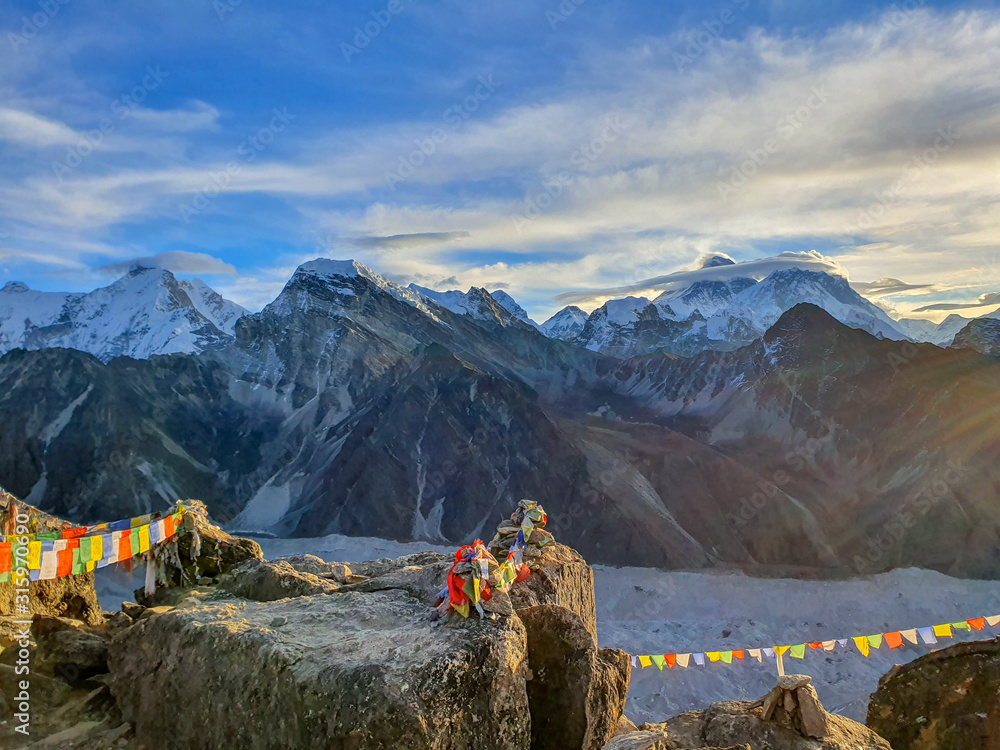 Picturesque view on Everest, Nuptse mountains and buddhist colorful ...
