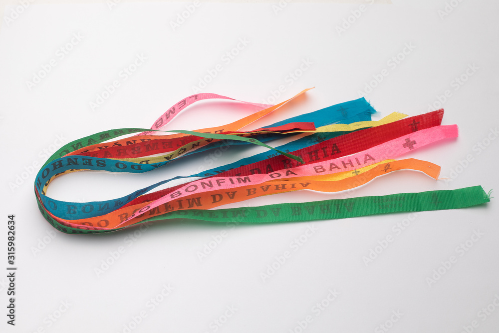 Lucky bracelets typical of Bahia, Brazil (Lembrança do Senhor do Bonfim ...