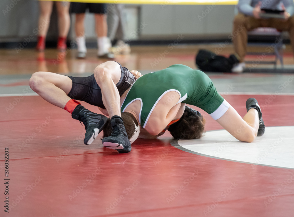 High School wrestlers competing at a wrestling meet Stock Photo | Adobe ...